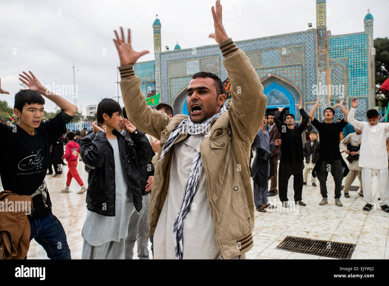 Shia Muslims beat themselves in front of the Mausoleum in the Shrine of ...