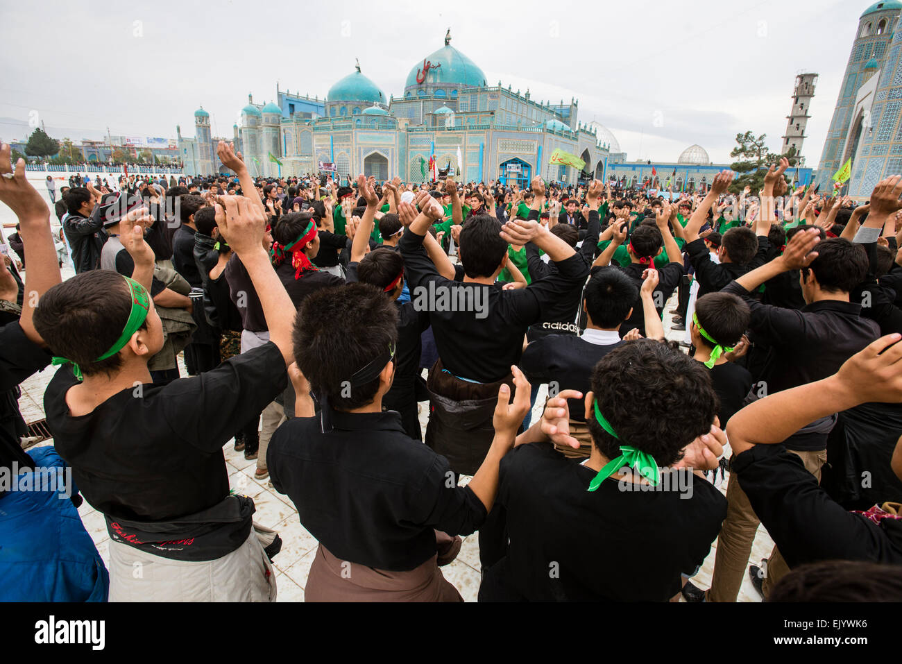 Shia Muslims beat themselves in front of the Mausoleum in the Shrine of ...