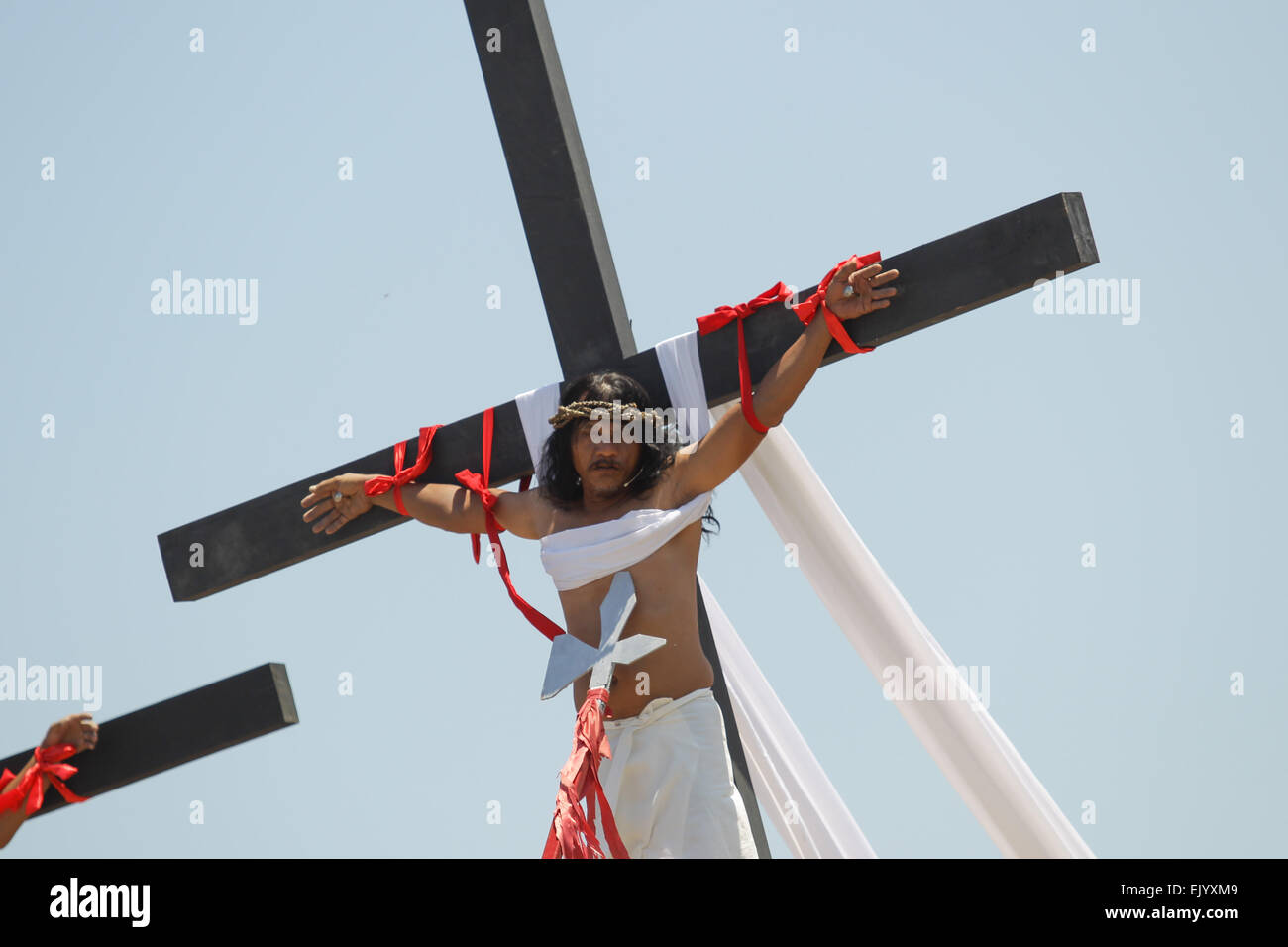 Pampanga, Philippines. 03rd Apr, 2015. Ruben Enaje, 55 is nailed on the ...