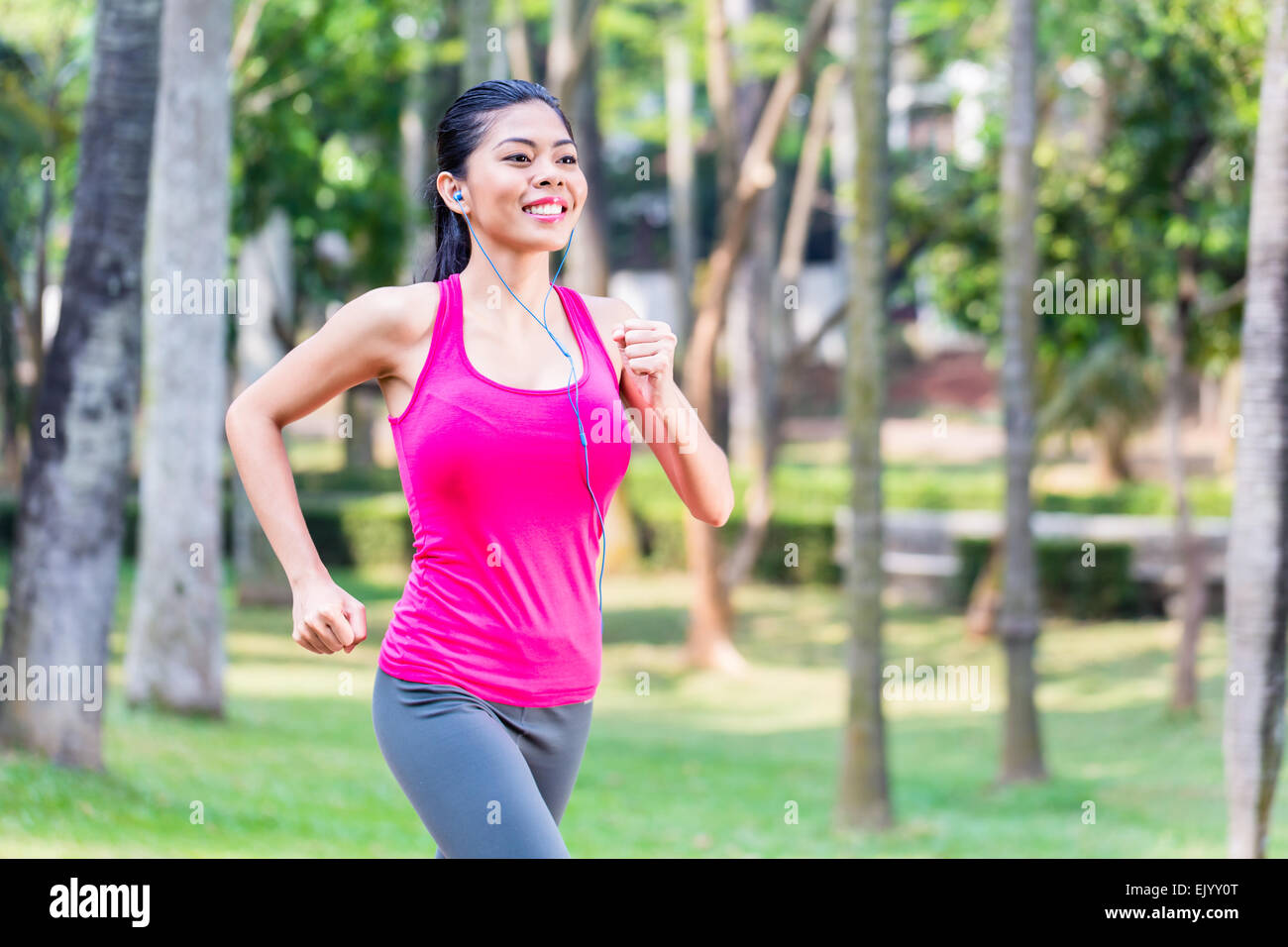 Asian woman running hi-res stock photography and images - Alamy