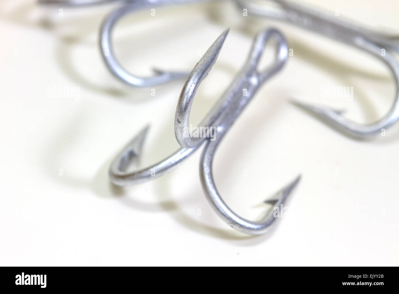 Fishing hook isolated on white background close up Stock Photo - Alamy
