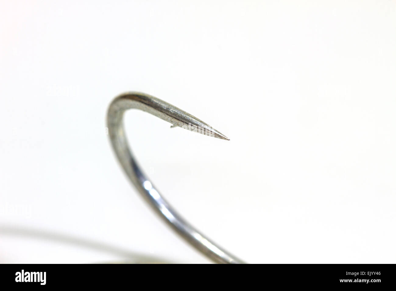 Fishing hook isolated on white background close up Stock Photo - Alamy