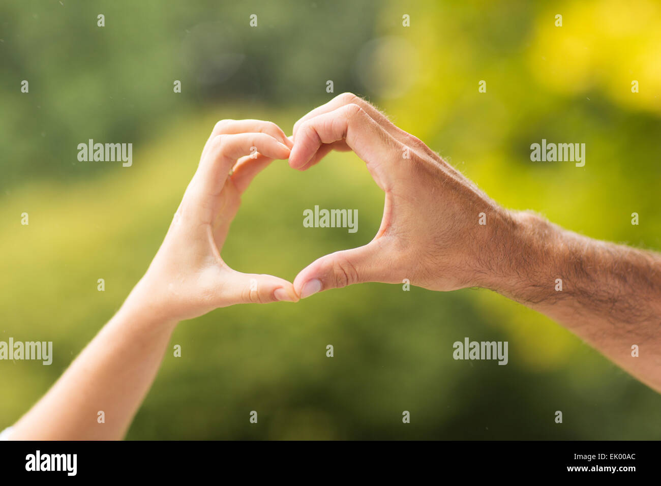 Couple heart hands close up hi-res stock photography and images - Alamy