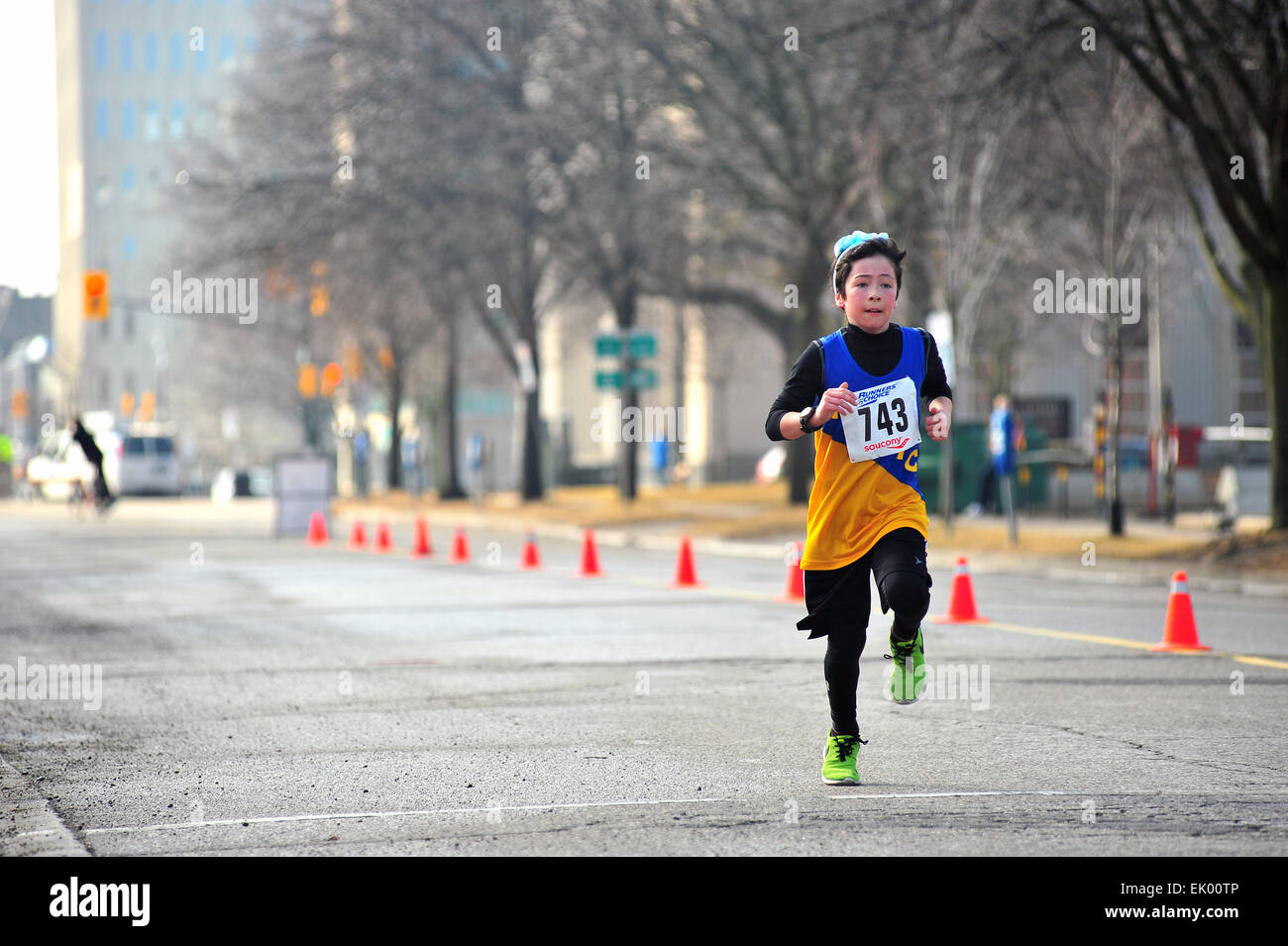 A boy competes in charity running event in Downtown London, Ontario ...