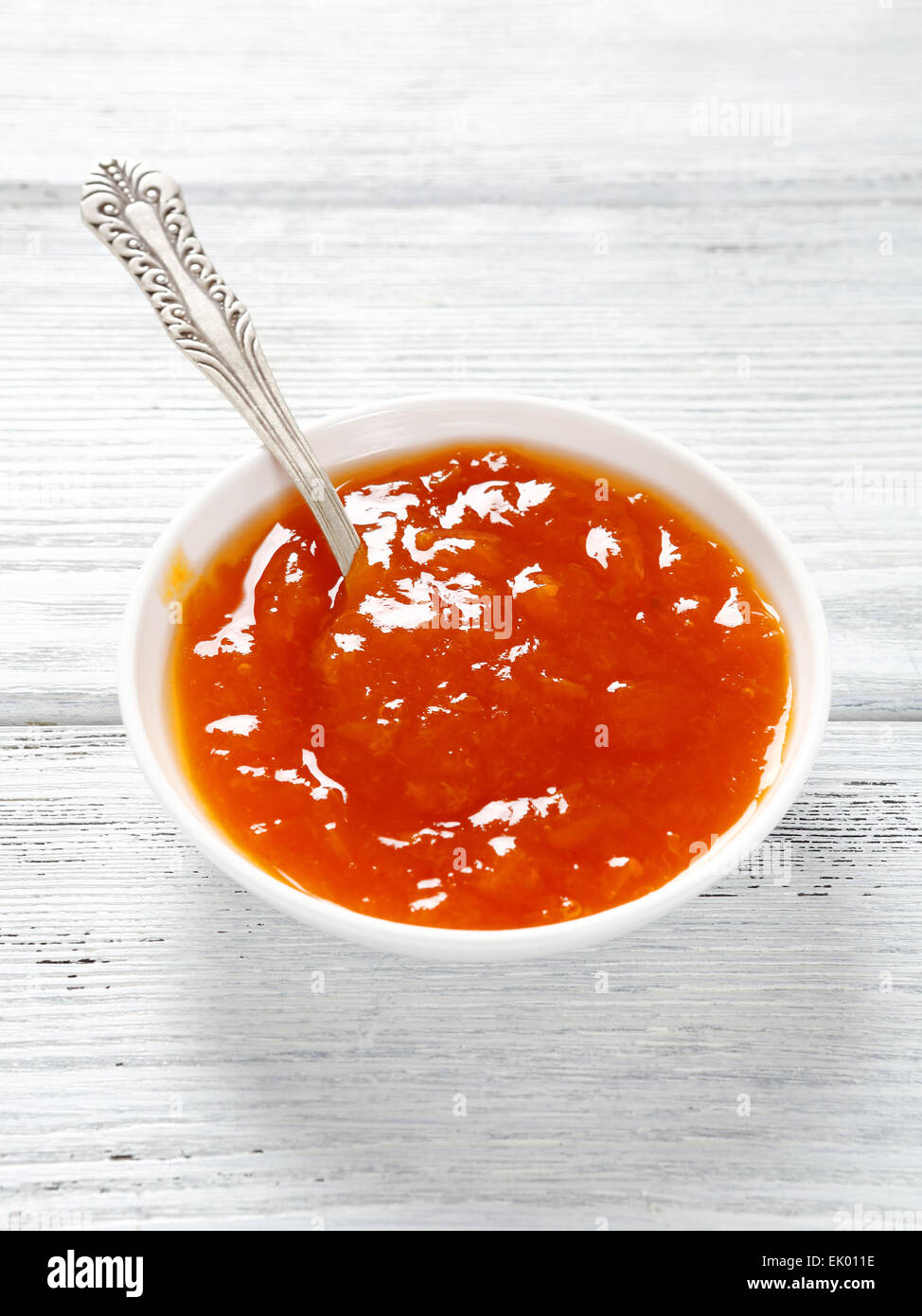 Jam in small white bowl, dessert Stock Photo - Alamy