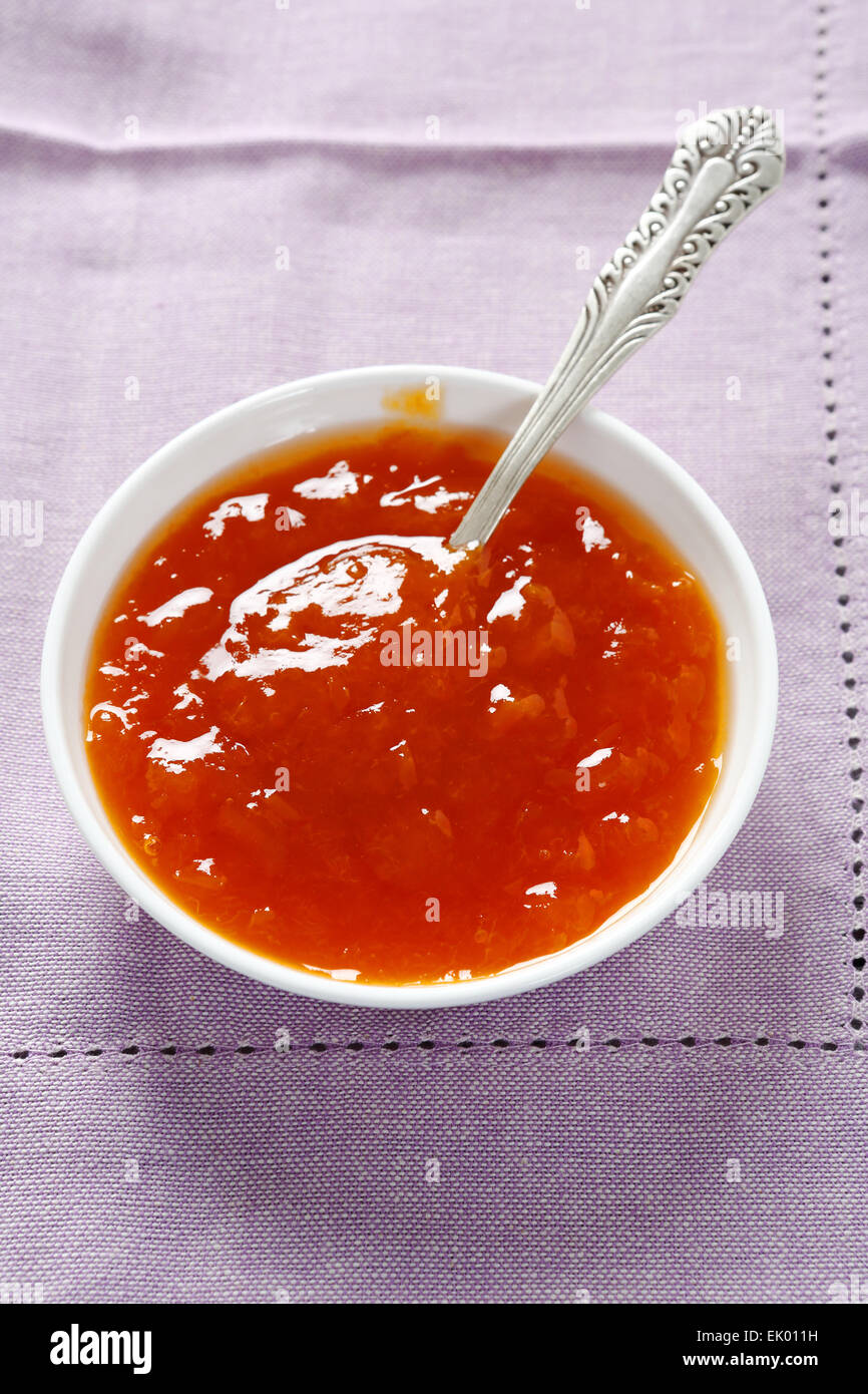Jam in a white bowl, food Stock Photo - Alamy