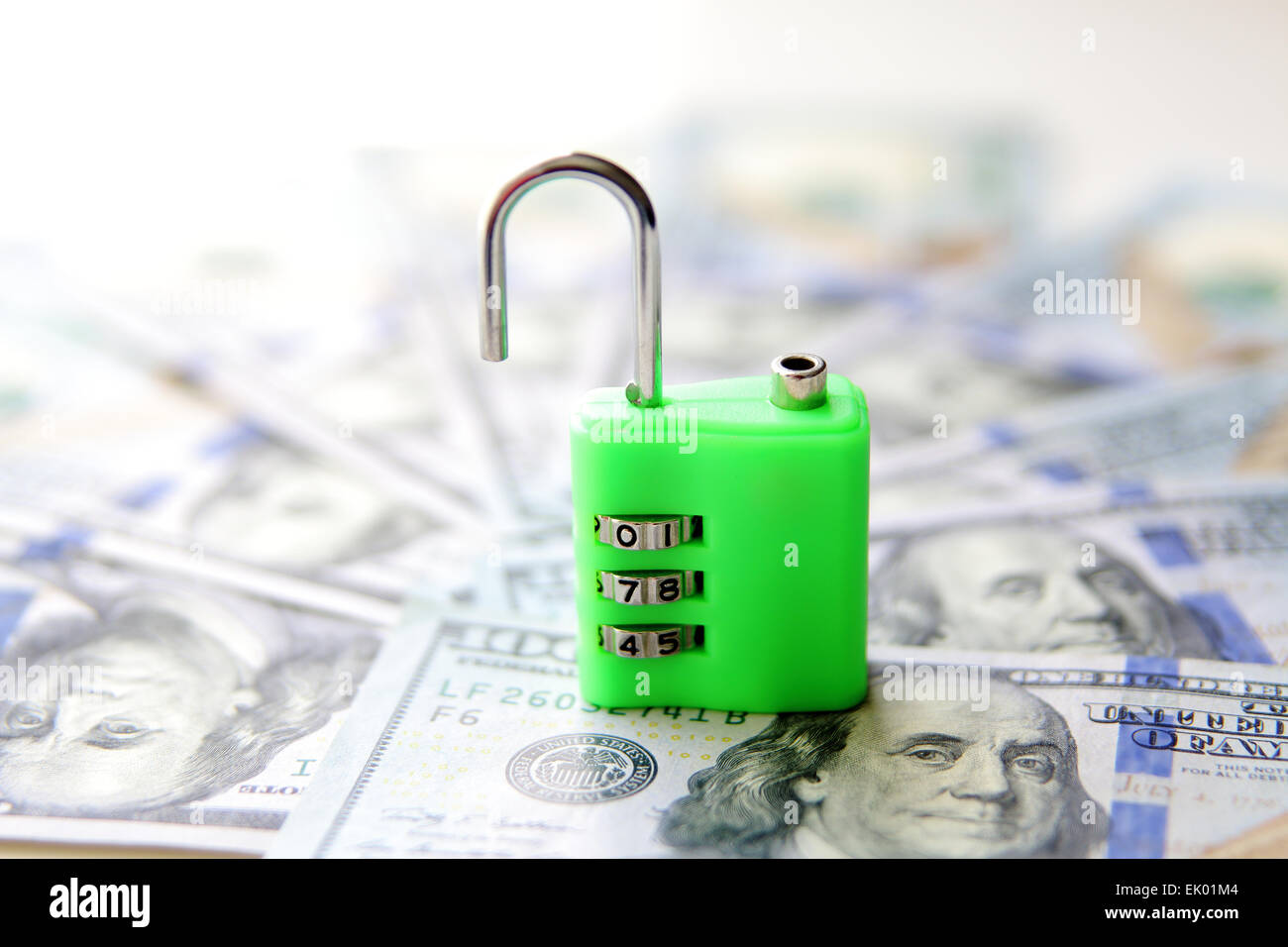 insecure money padlock concept. US dollars currency banknotes Stock ...