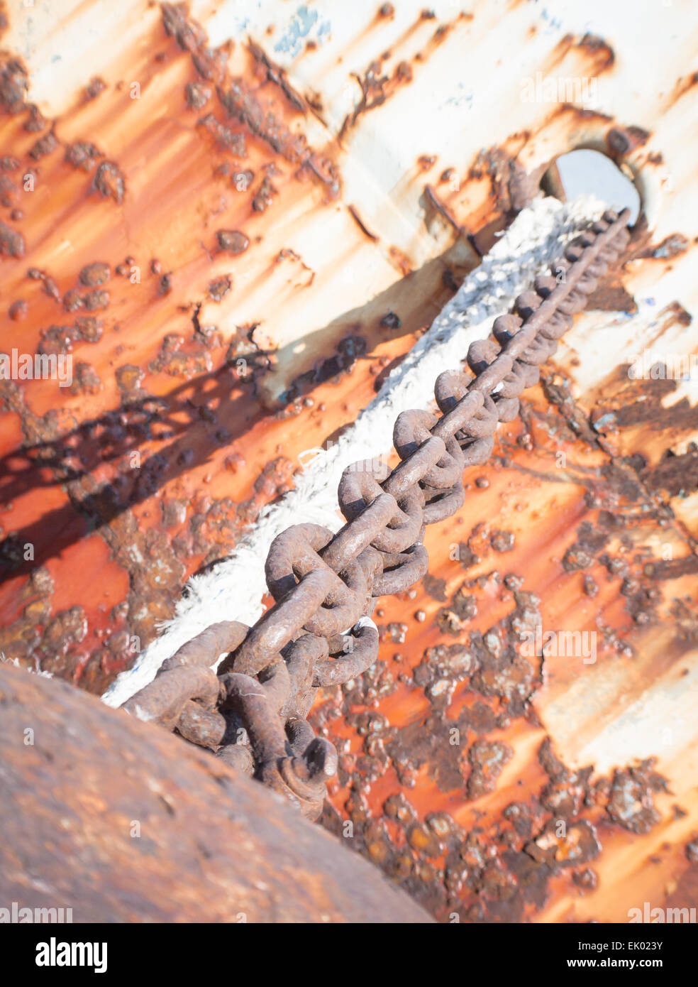 Rusty brown chain. Close up of a rust brown chain of a abandoned boat ...