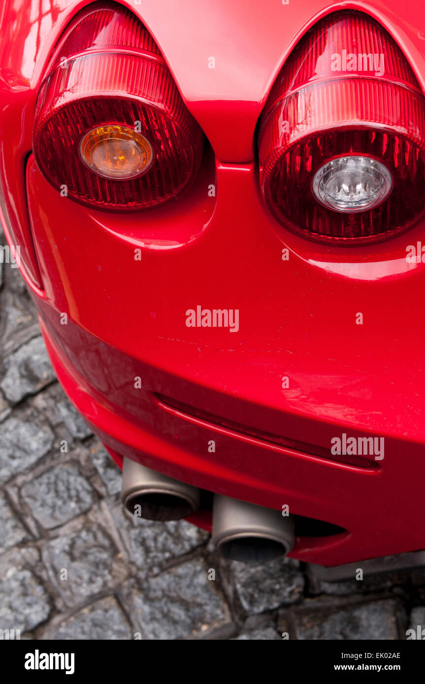 Rear lights and exhaust on a red Ferrari car Stock Photo - Alamy