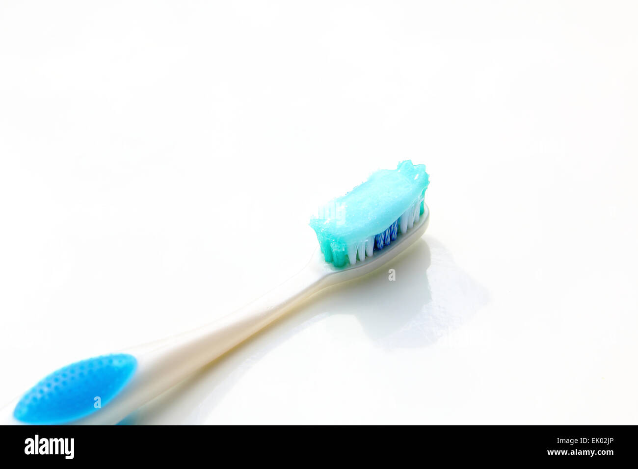 toothbrush on the table with toothpaste and white background Stock ...