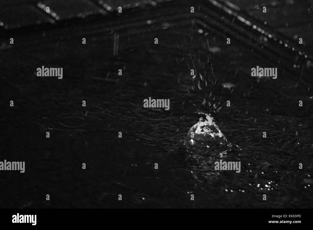 Rain Water splashing on the streets of Budapest Stock Photo - Alamy