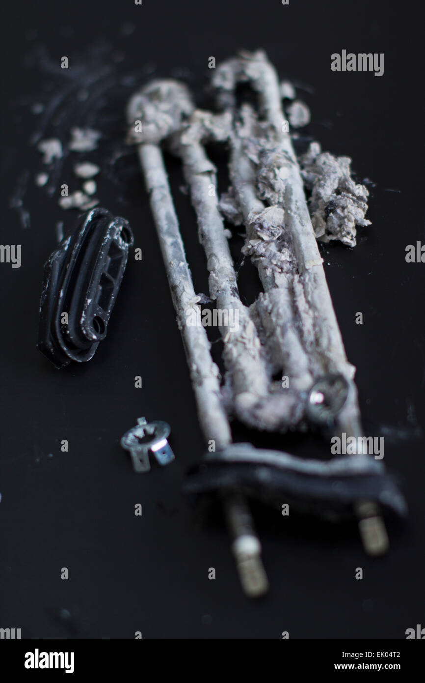 Limescale Damaged broken Washing machine element covered in lime scale ...