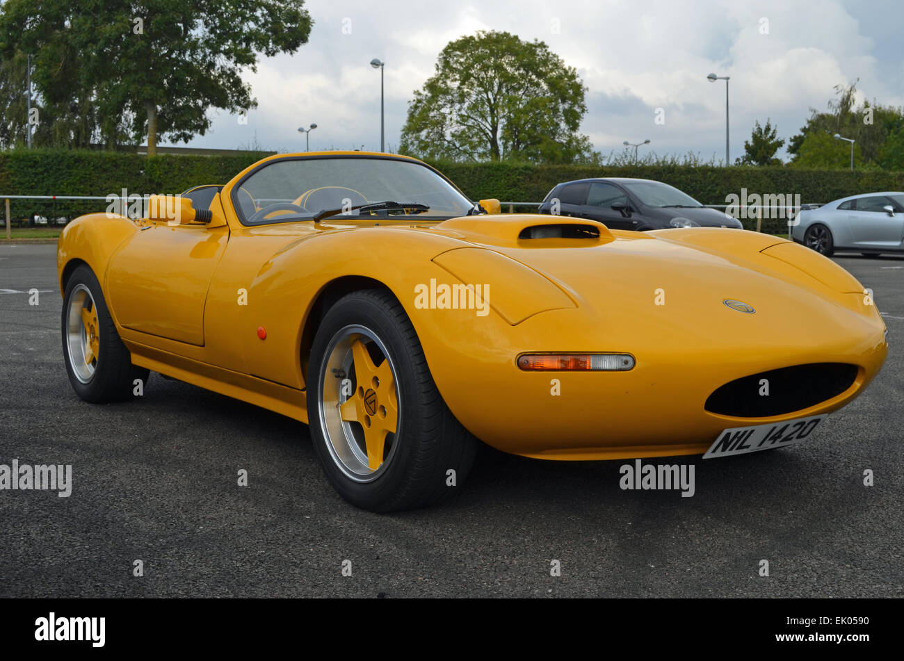Yellow Ginetta G33 Convertible Stock Photo - Alamy