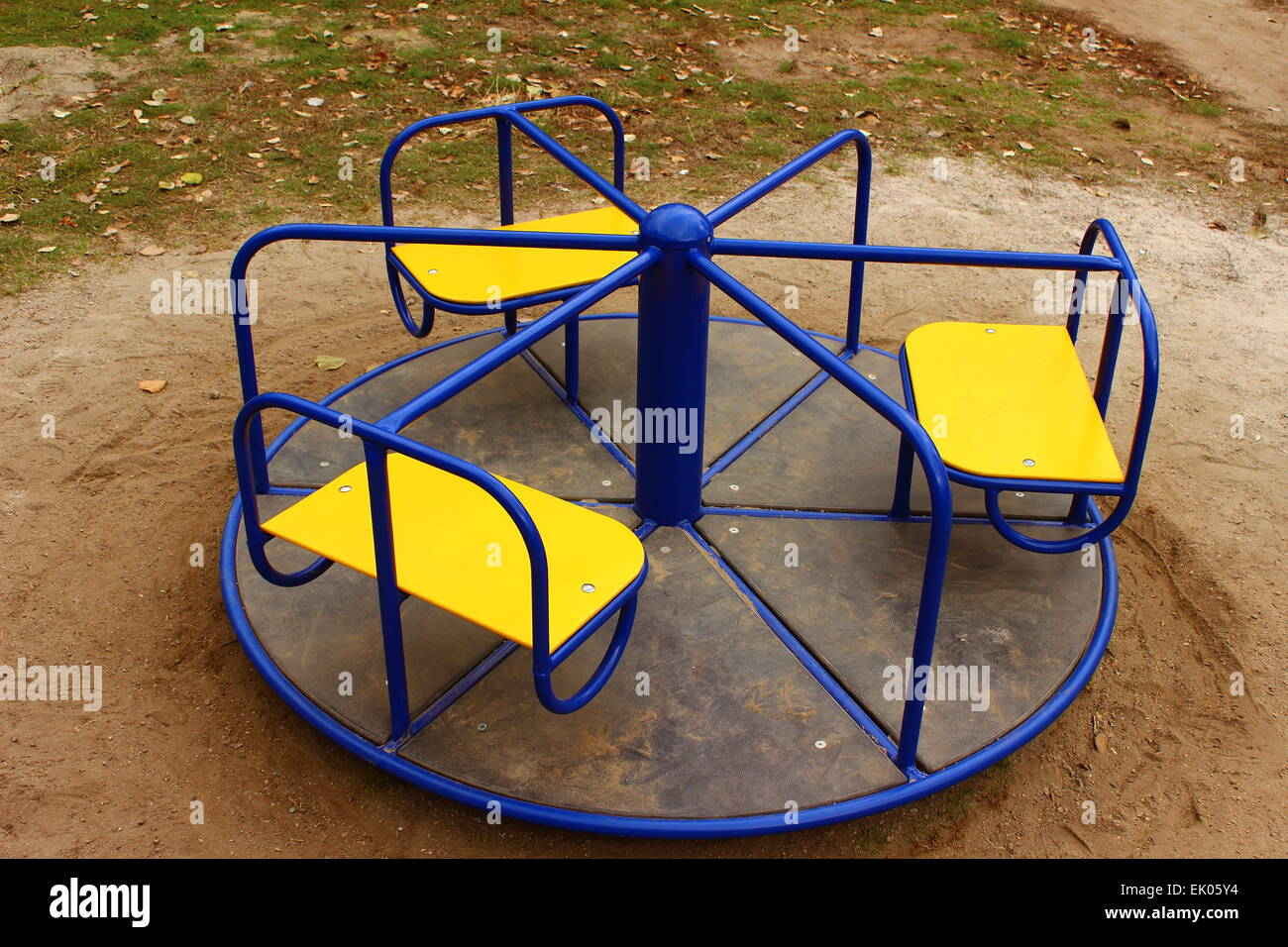 Playground roundabout hi-res stock photography and images - Alamy