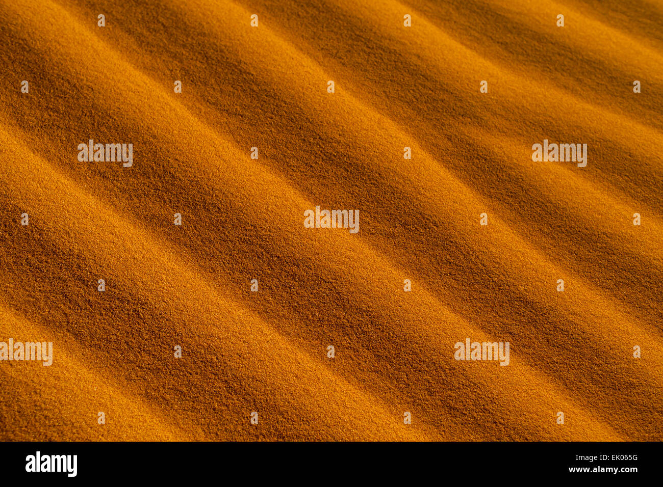 golden sand stripes texture abstract bakcground Stock Photo - Alamy