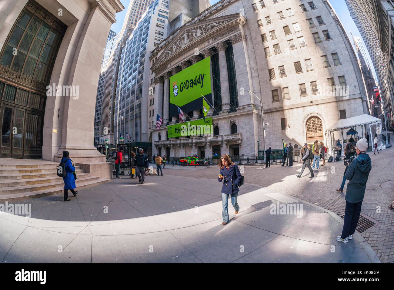 Visitors outside the New York Stock Exchange decorated for the first ...