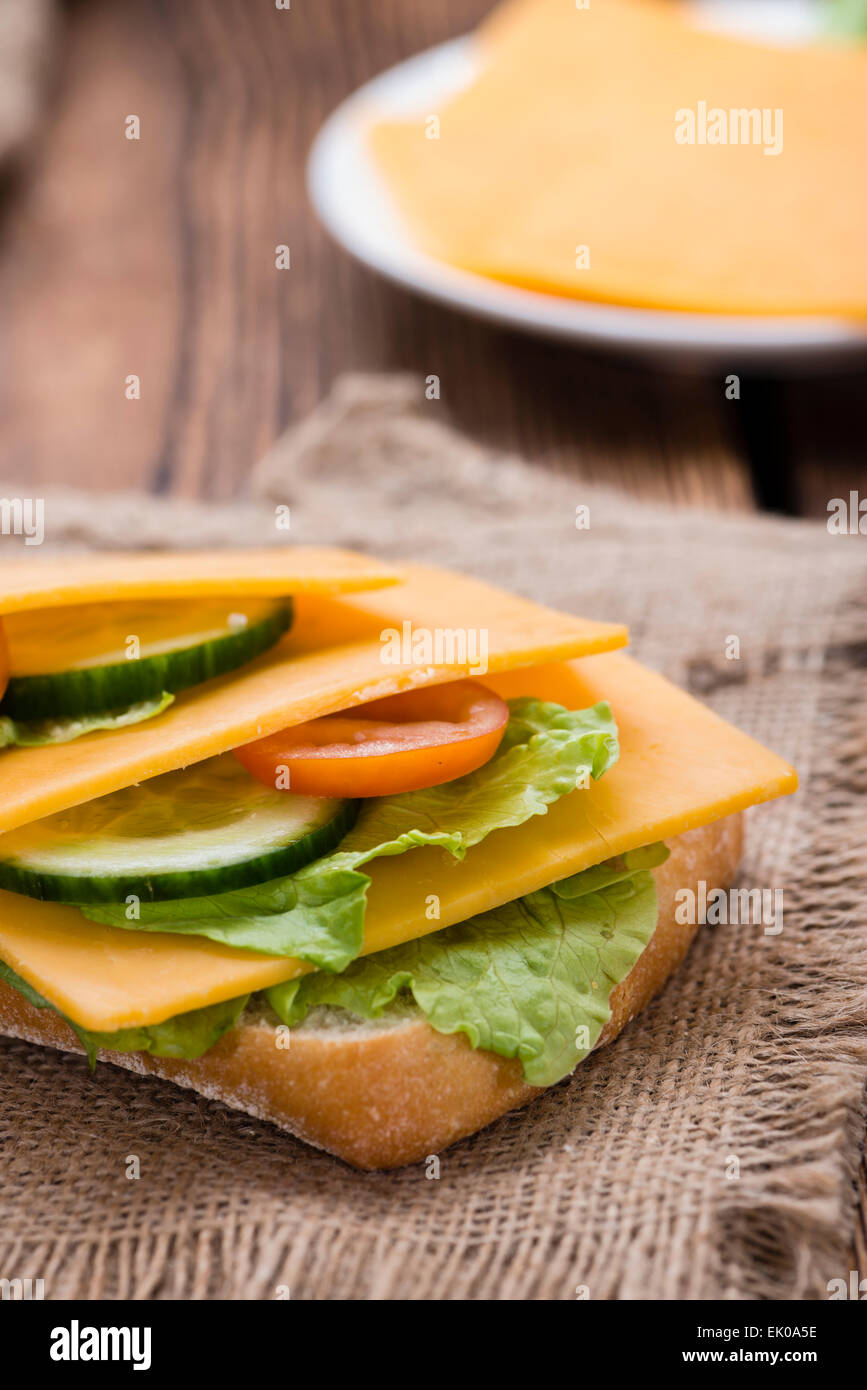 Cheddar Cheese Sandwich (detailed close-up shot) on wooden background ...