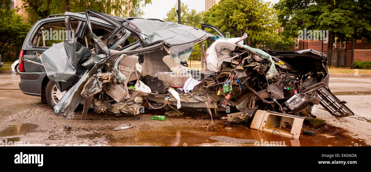 Totaled minivan; car after terrible collision Stock Photo - Alamy