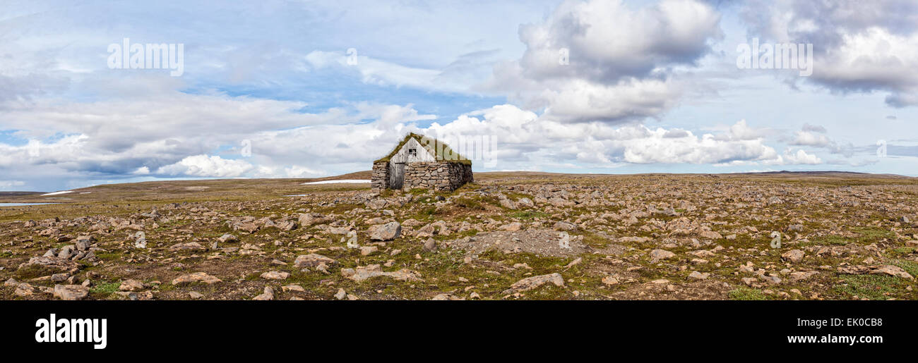 Panoramic view of a stone turf roofed shelter house in the Westfjords ...