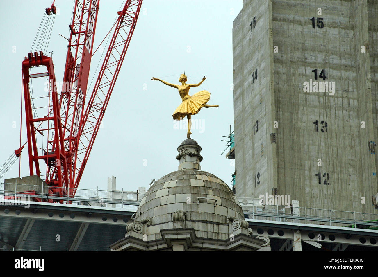 London, UK, 03 April 2015, the gilded statue of ballerina Anna Pavlova above the cupola of the ...