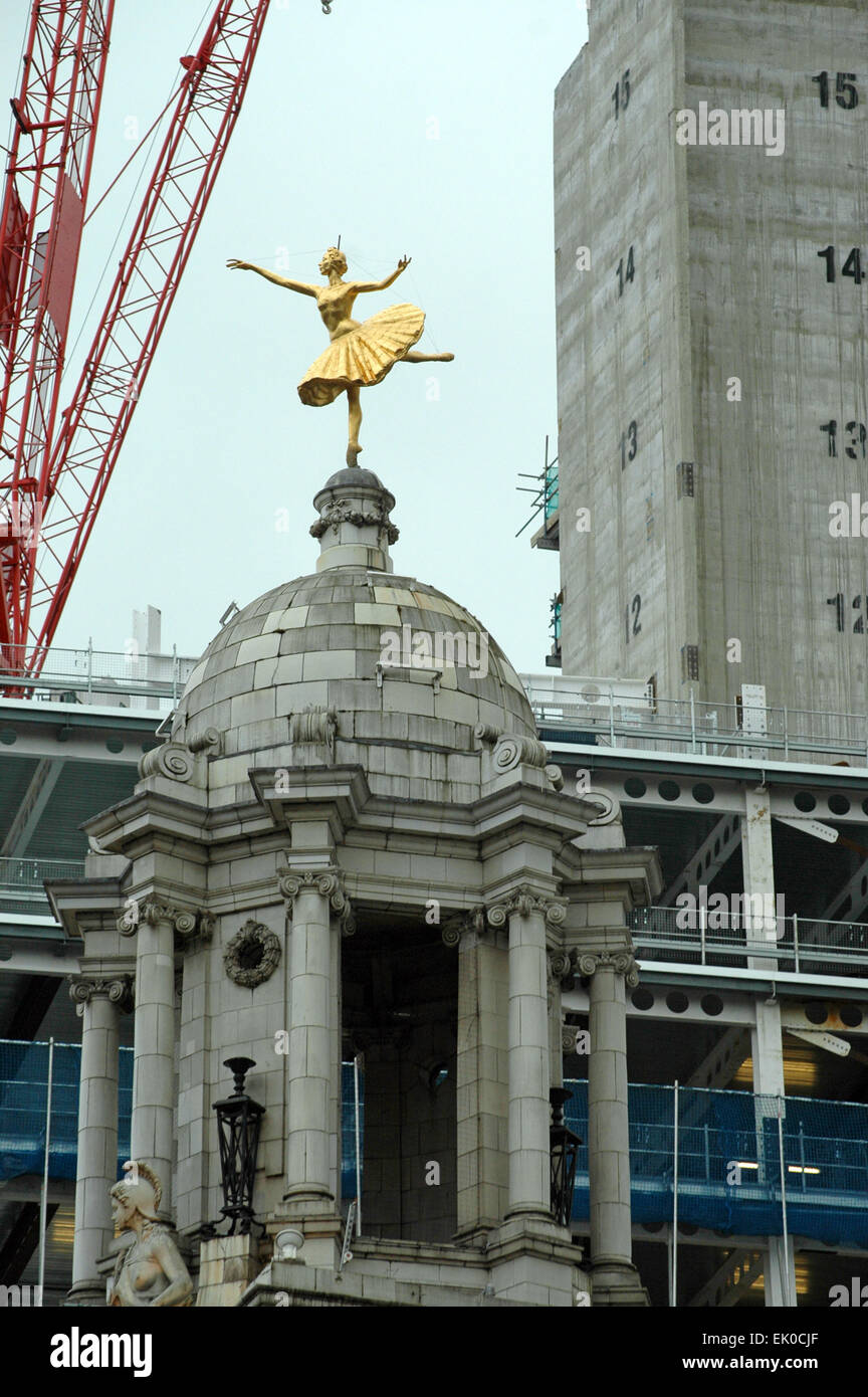 London, UK, 03 April 2015, the gilded statue of ballerina Anna Pavlova above the cupola of the ...