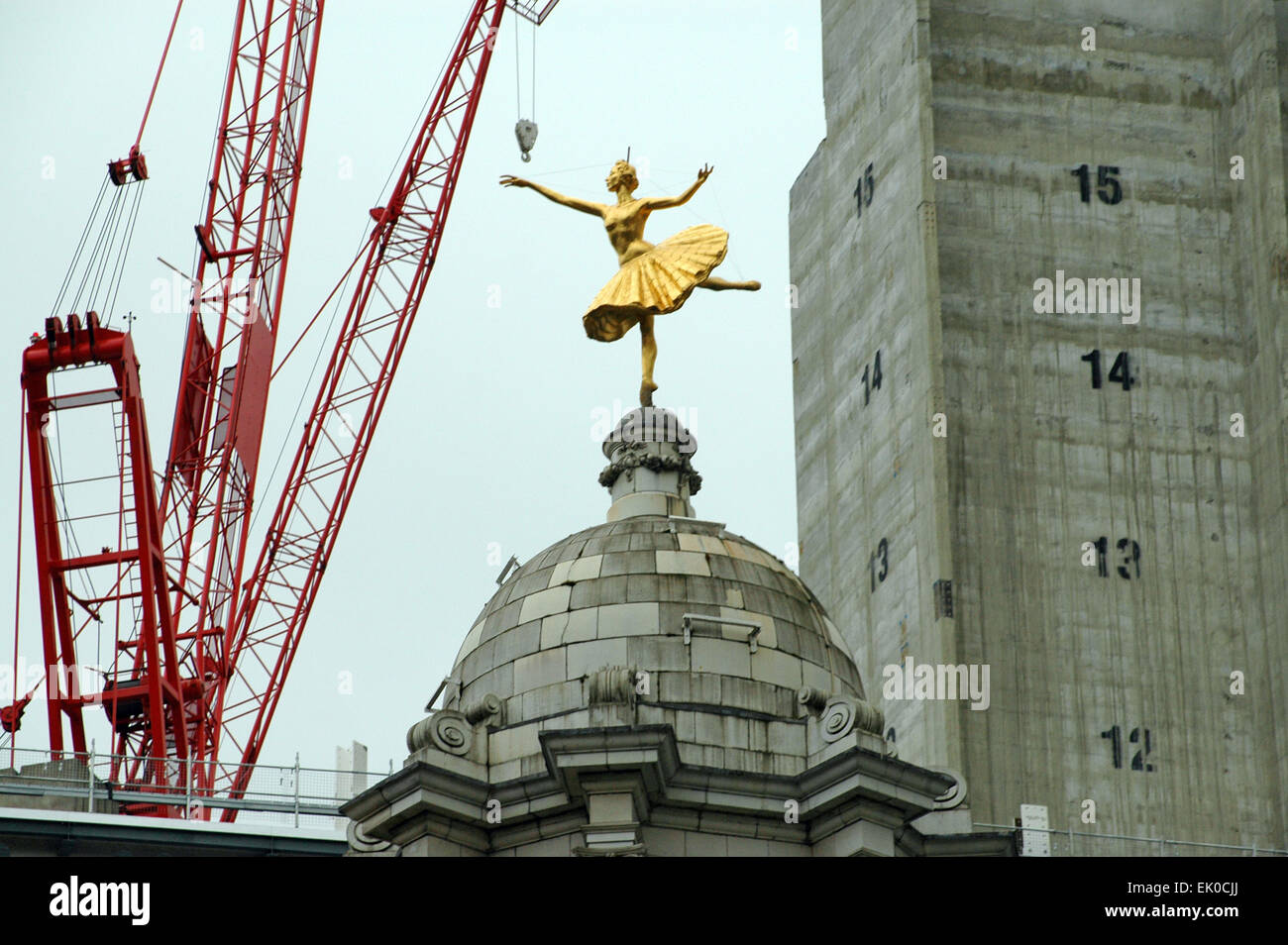 London, UK, 03 April 2015, the gilded statue of ballerina Anna Pavlova above the cupola of the ...
