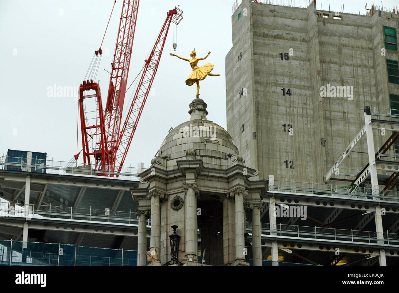 London, UK, 03 April 2015, the gilded statue of ballerina Anna Pavlova above the cupola of the ...