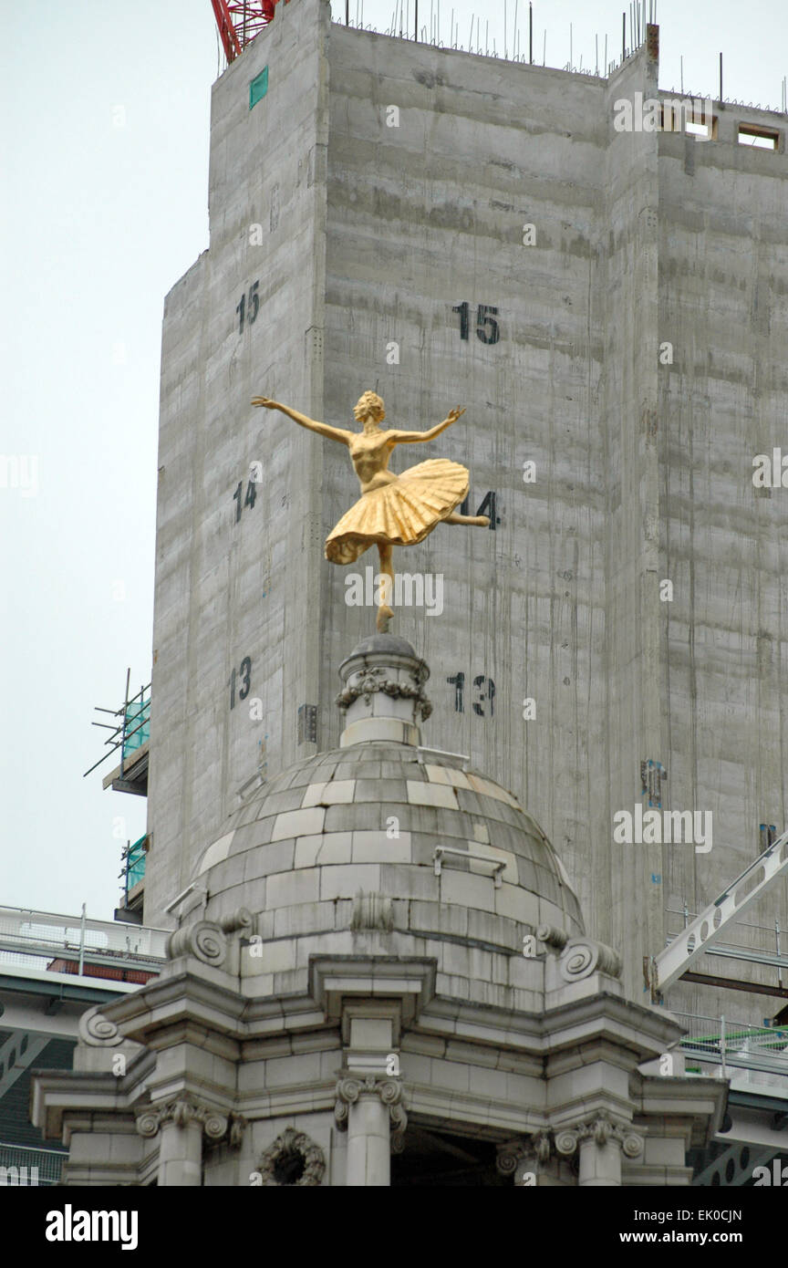 London, UK, 03 April 2015, the gilded statue of ballerina Anna Pavlova above the cupola of the ...