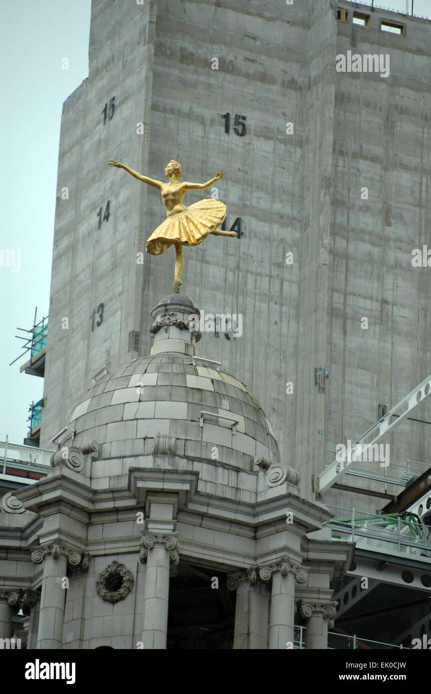 London, UK, 03 April 2015, the gilded statue of ballerina Anna Pavlova above the cupola of the ...