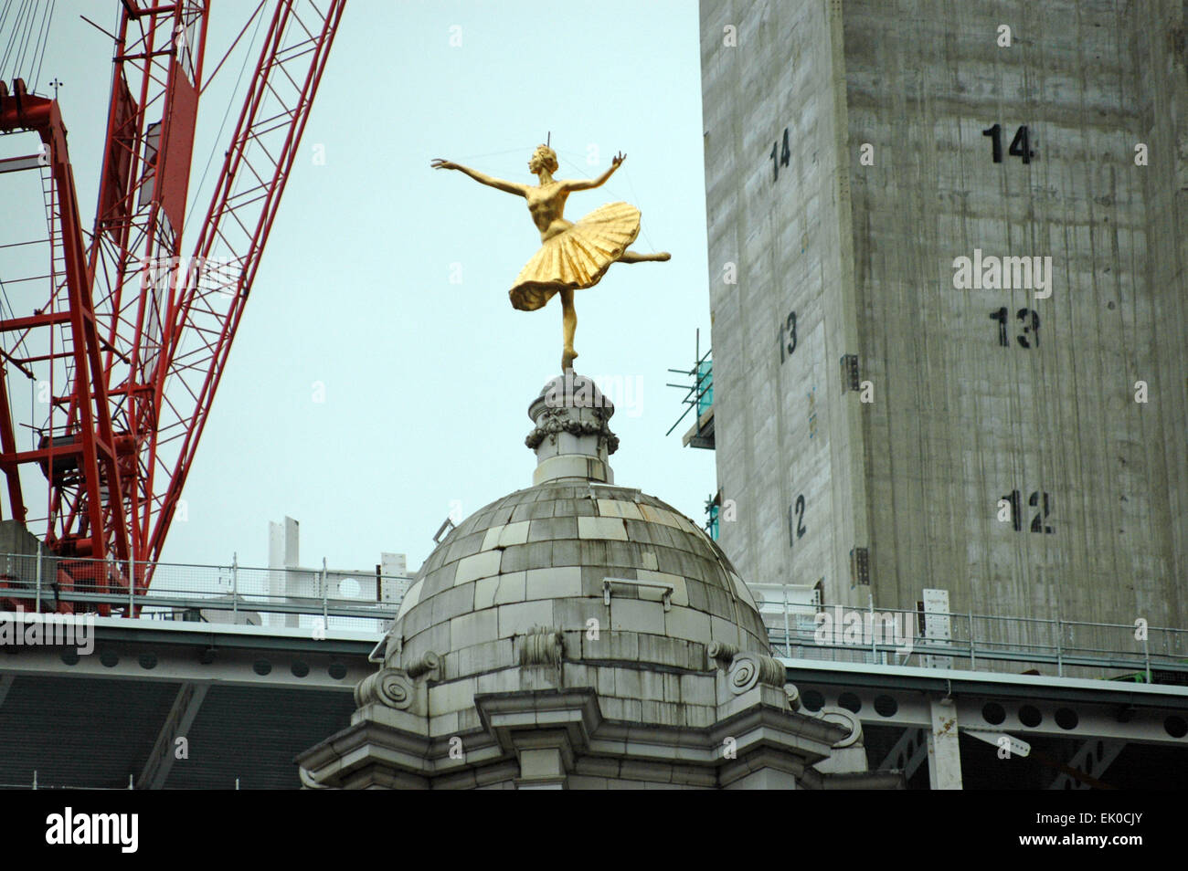 London, UK, 03 April 2015, the gilded statue of ballerina Anna Pavlova above the cupola of the ...
