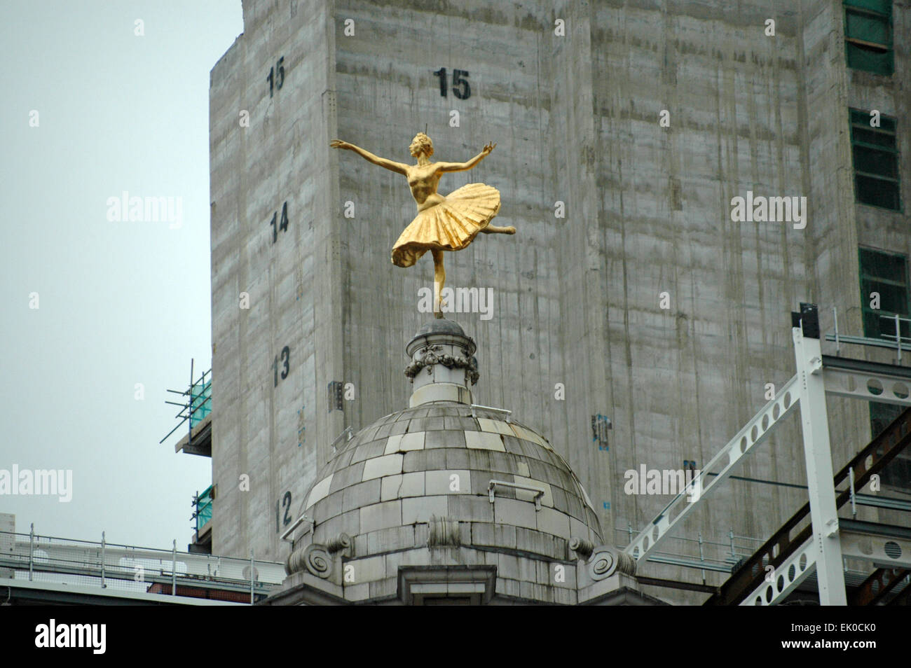 London, UK, 03 April 2015, the gilded statue of ballerina Anna Pavlova above the cupola of the ...