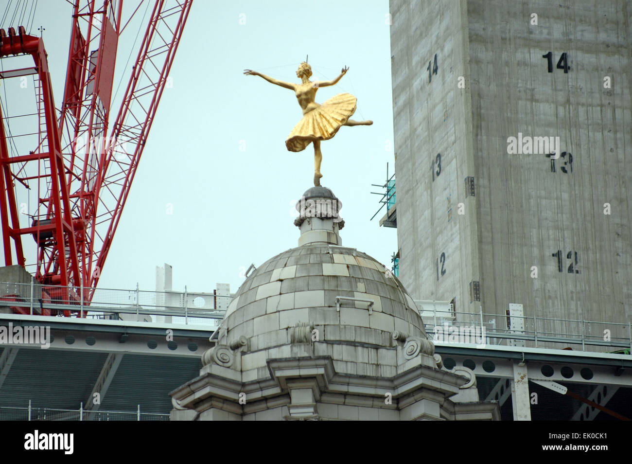 London, UK, 03 April 2015, the gilded statue of ballerina Anna Pavlova above the cupola of the ...