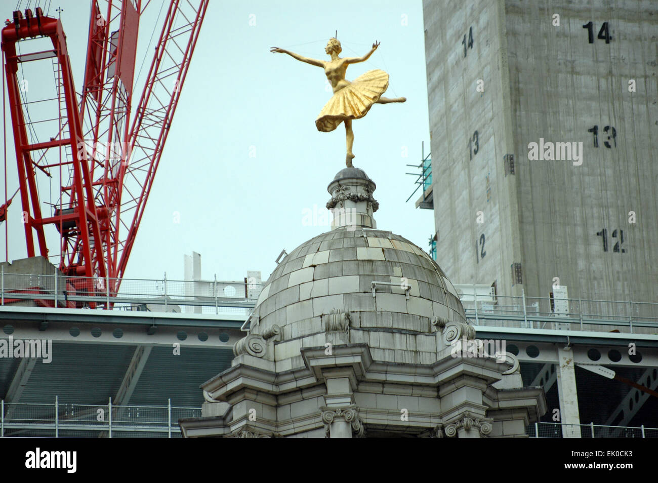 London, UK, 03 April 2015, the gilded statue of ballerina Anna Pavlova above the cupola of the ...