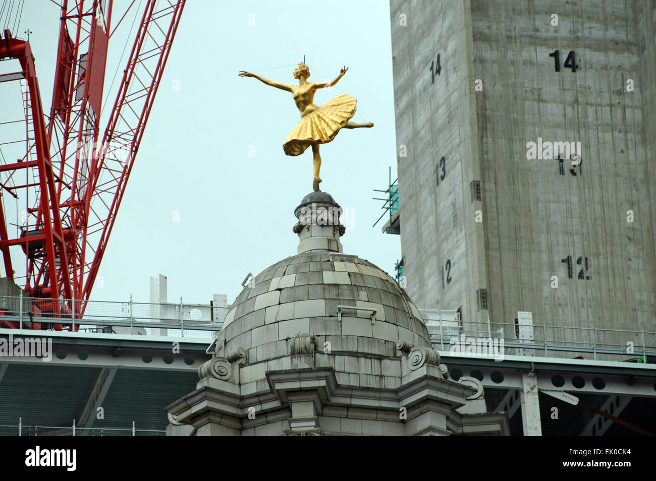 London, UK, 03 April 2015, the gilded statue of ballerina Anna Pavlova above the cupola of the ...