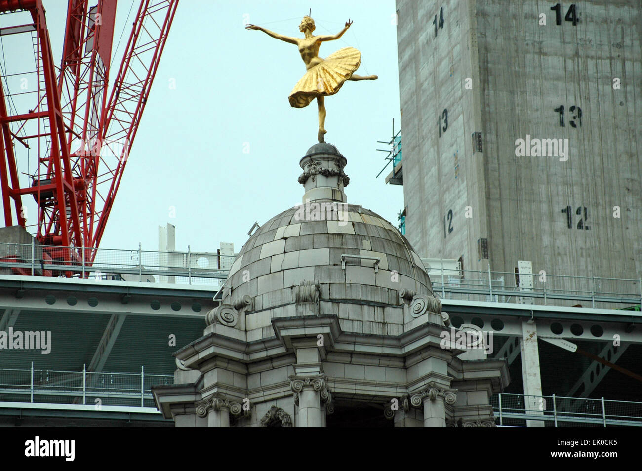London, UK, 03 April 2015, the gilded statue of ballerina Anna Pavlova above the cupola of the ...
