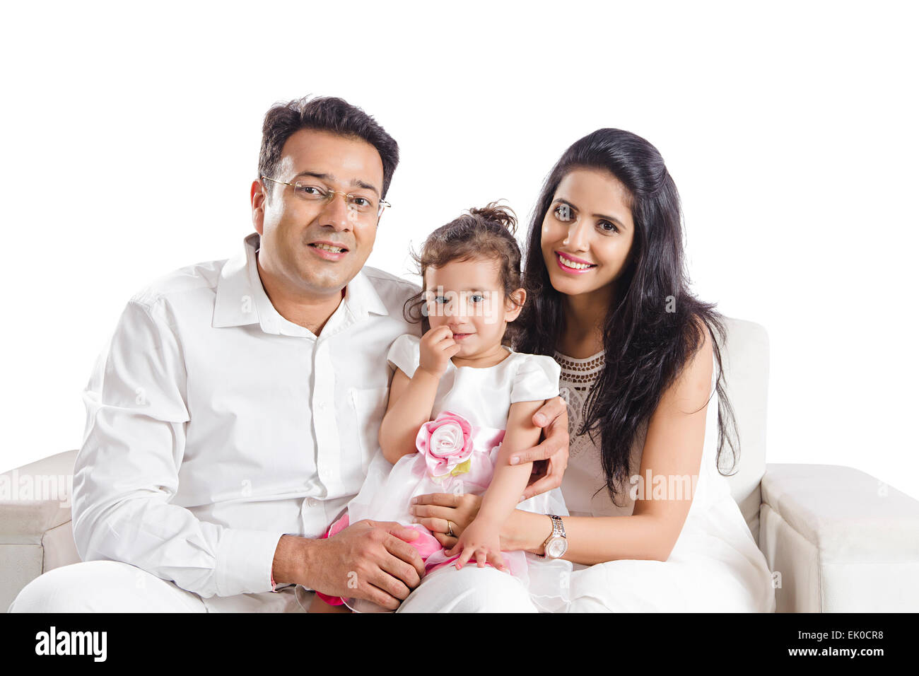 indian Parents and daughter sitting home Stock Photo - Alamy