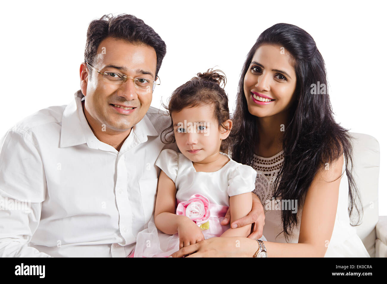 indian Parents and daughter sitting home Stock Photo - Alamy