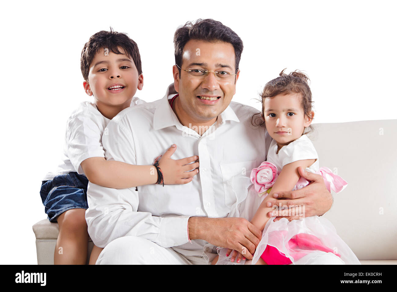 indian father and kids sitting home Stock Photo - Alamy