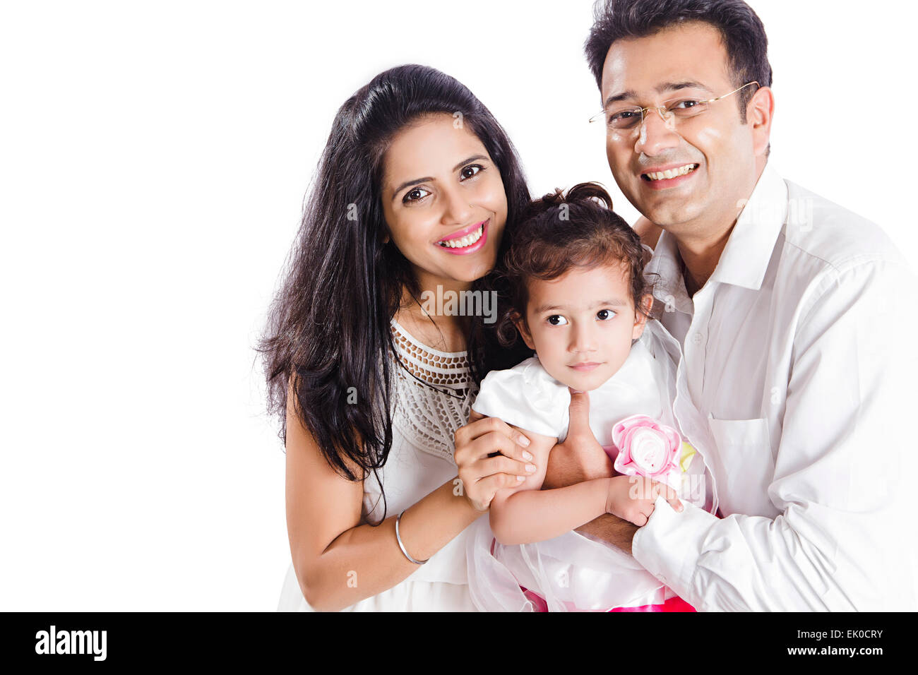 indian Parents and daughter sitting home Stock Photo - Alamy