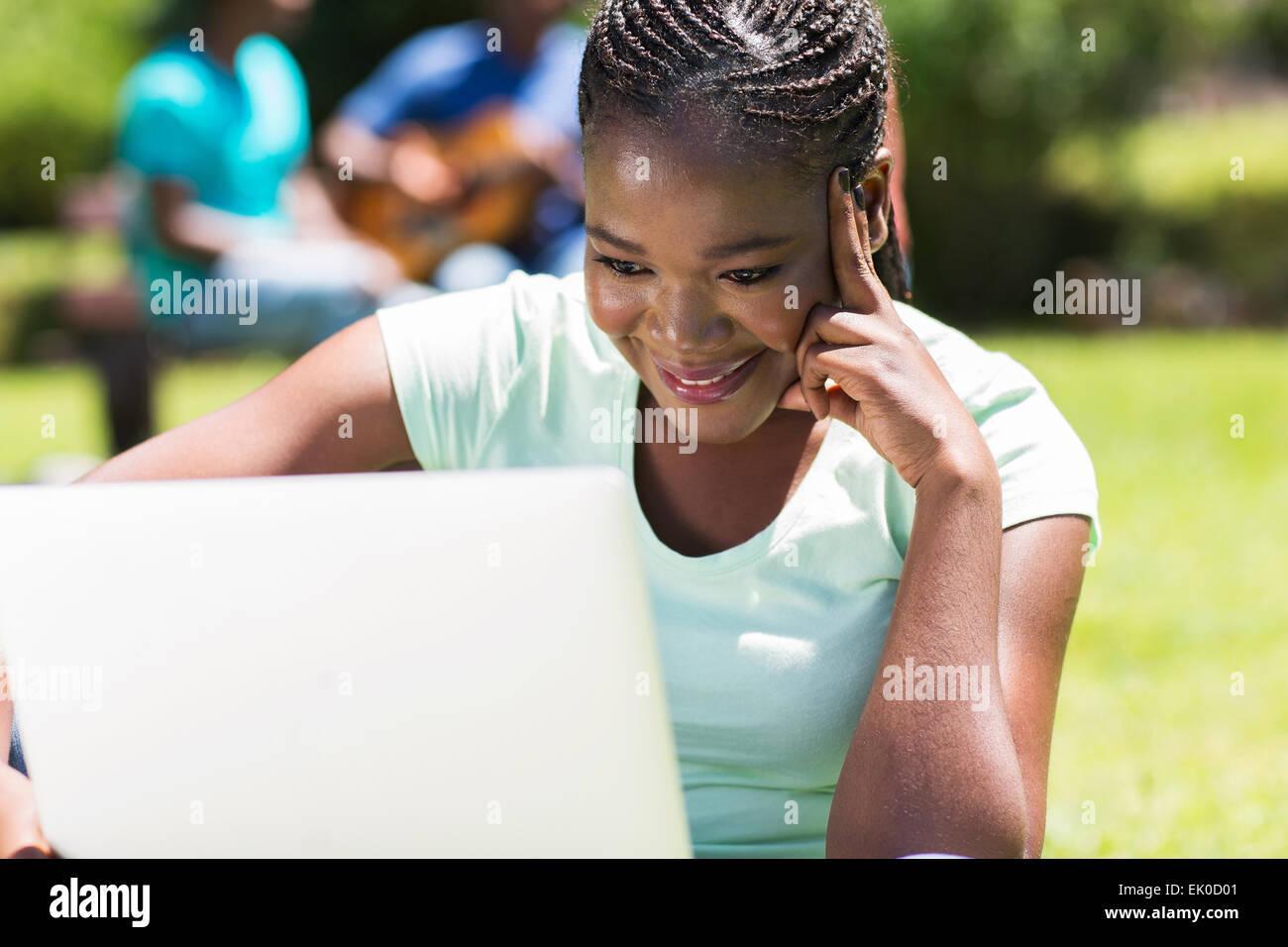 pretty female African college student working on laptop computer Stock ...