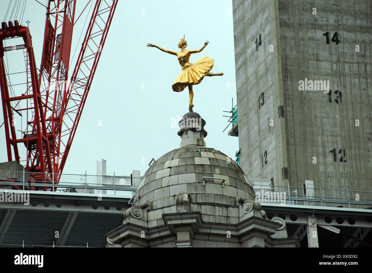 London, UK, 03 April 2015, the gilded statue of ballerina Anna Pavlova above the cupola of the ...