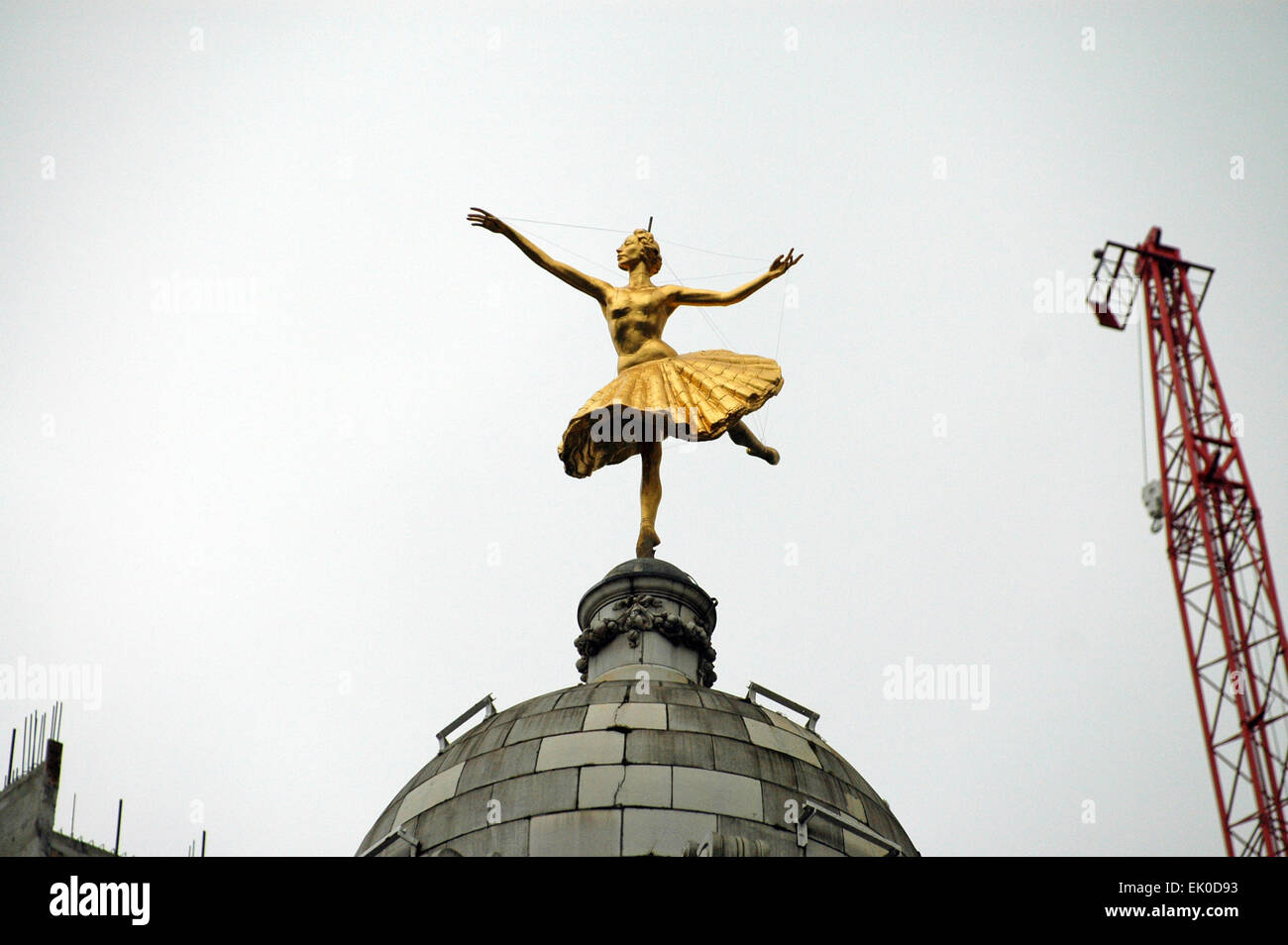 London, UK, 03 April 2015, the gilded statue of ballerina Anna Pavlova above the cupola of the ...