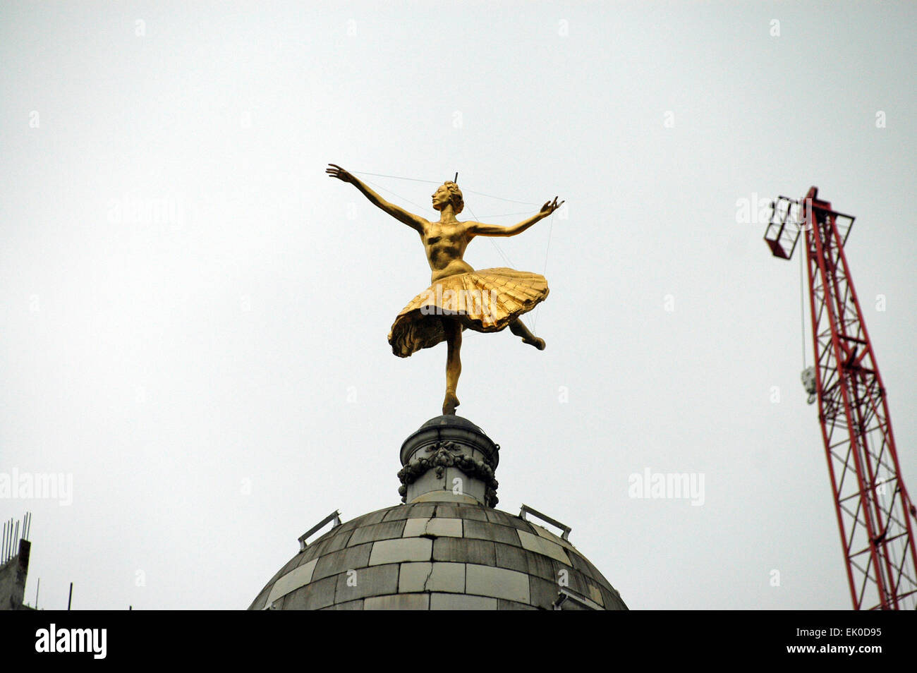 London, UK, 03 April 2015, the gilded statue of ballerina Anna Pavlova above the cupola of the ...