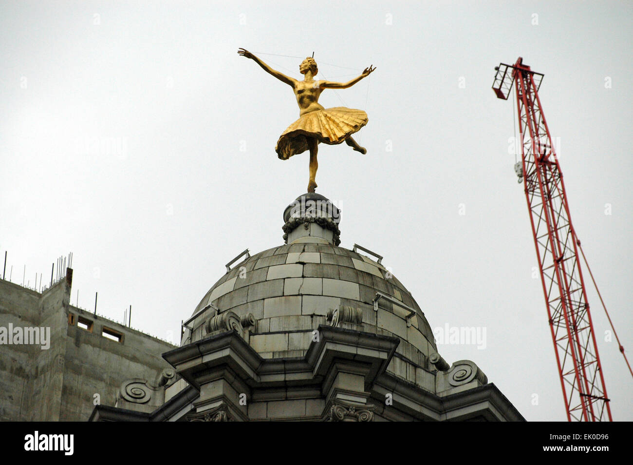 London, UK, 03 April 2015, the gilded statue of ballerina Anna Pavlova above the cupola of the ...