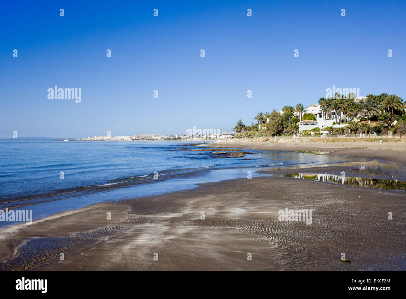Tranquil, empty beach in Marbella, resort town on Costa del Sol in ...