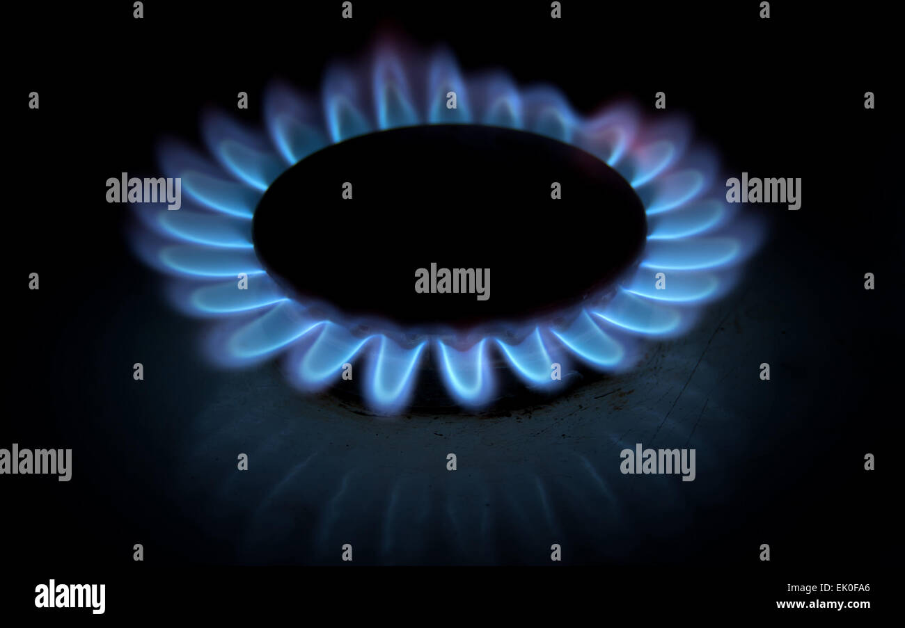 blue gas stove on black Stock Photo - Alamy