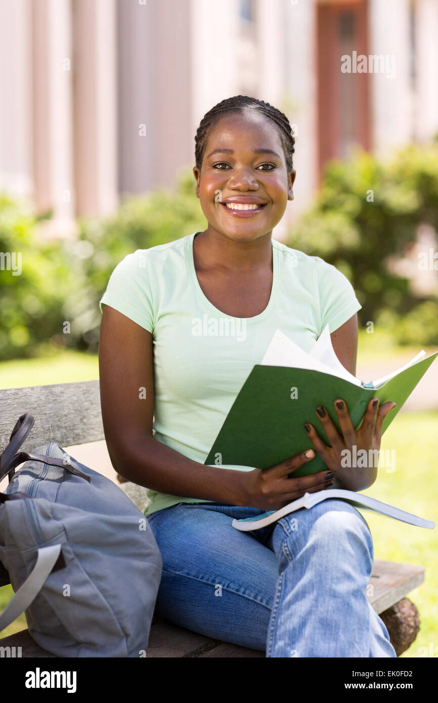 beautiful young college student studying outdoors Stock Photo - Alamy