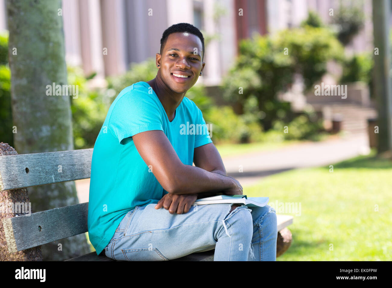 smiling male African university student outdoors Stock Photo - Alamy