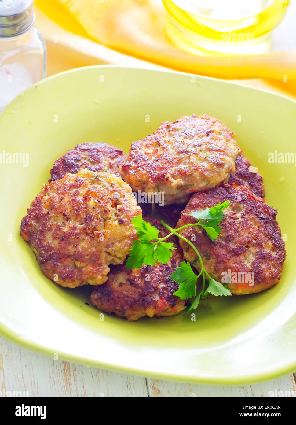 cutlets on the green plate Stock Photo - Alamy