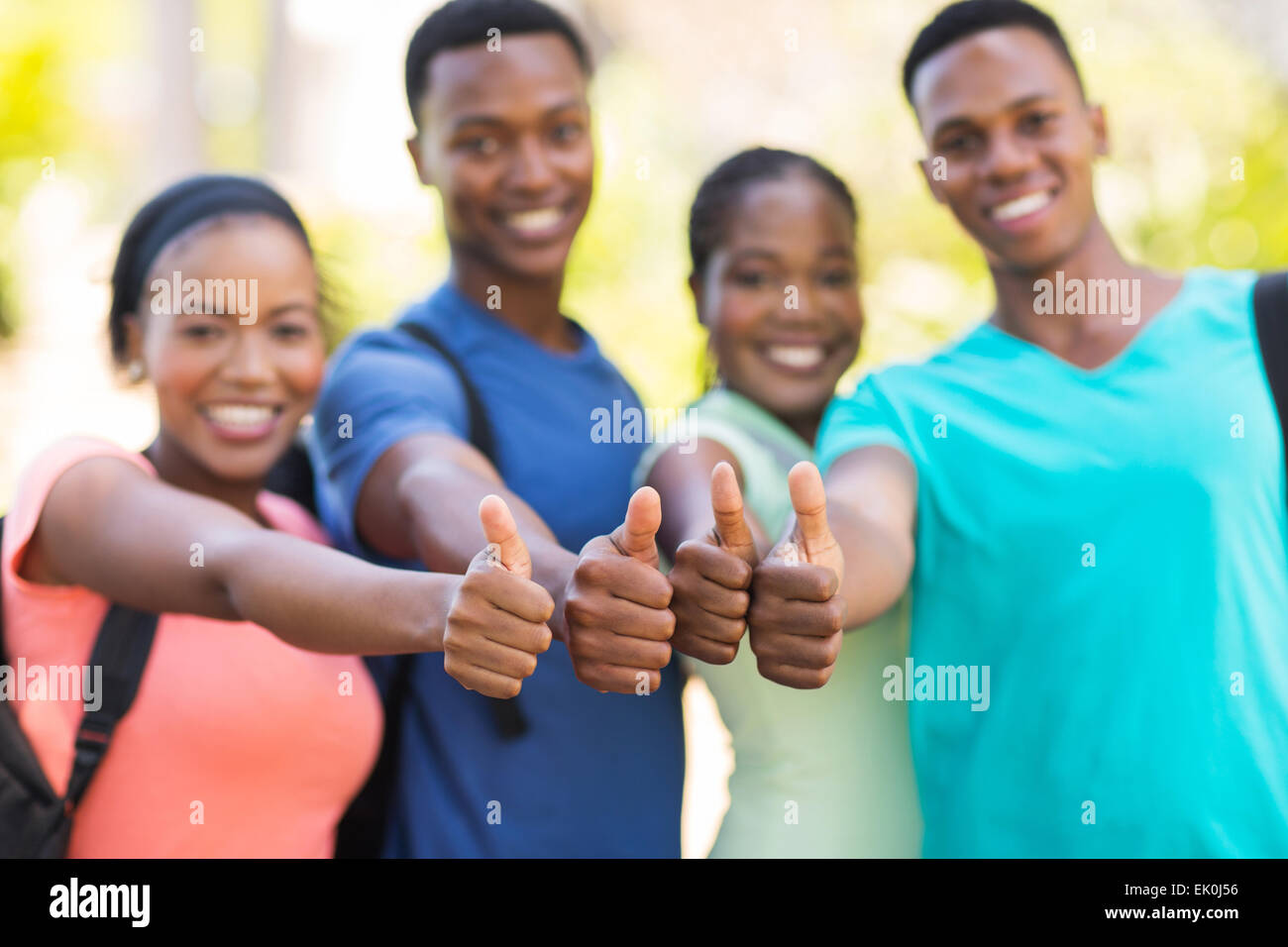 Positive friends thumbs up hi-res stock photography and images - Alamy